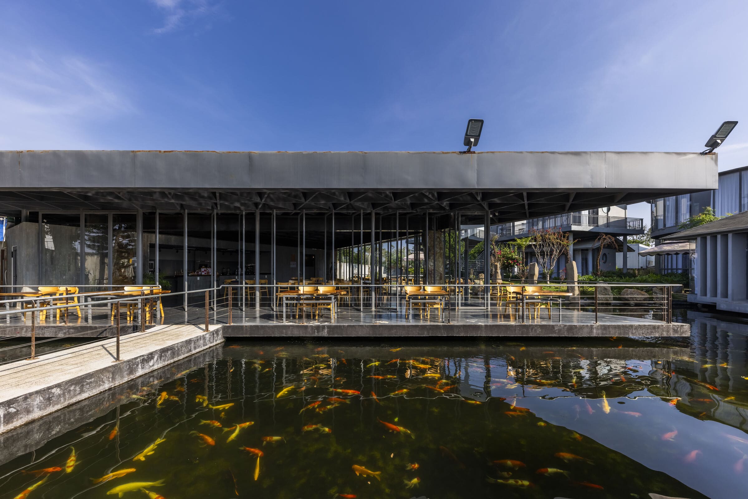 Lado Coffee by NTA Architecture & SPNG Architects | illustrarch