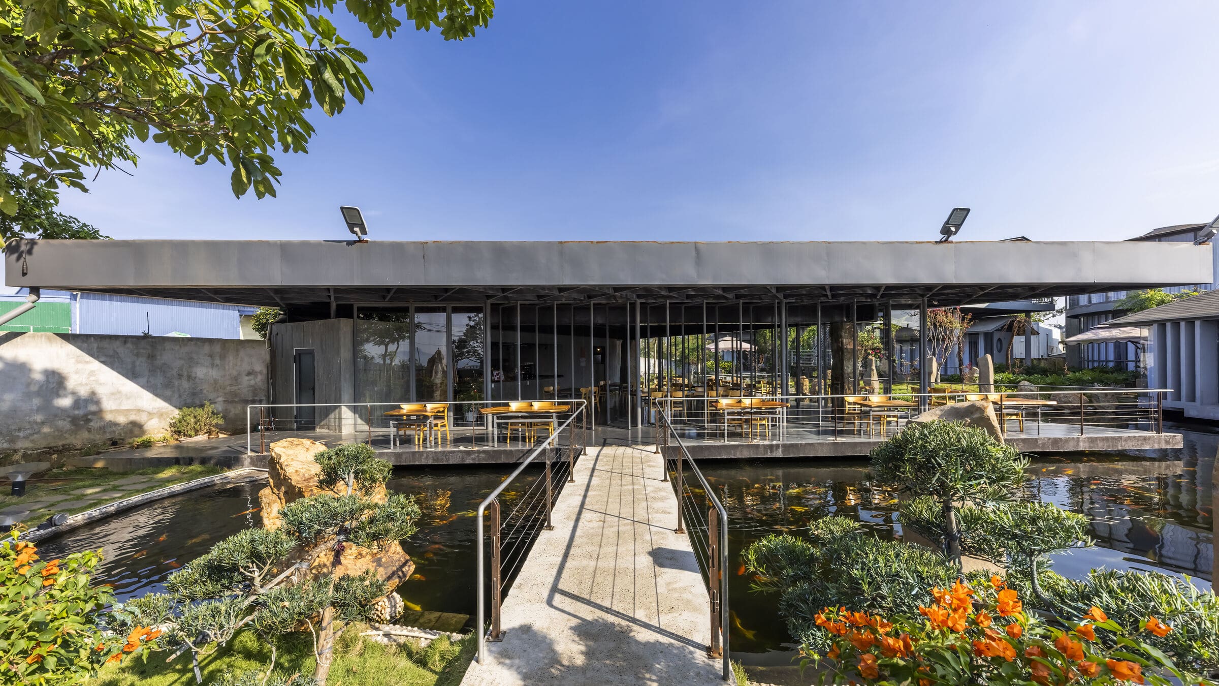 Lado Coffee by NTA Architecture & SPNG Architects | illustrarch